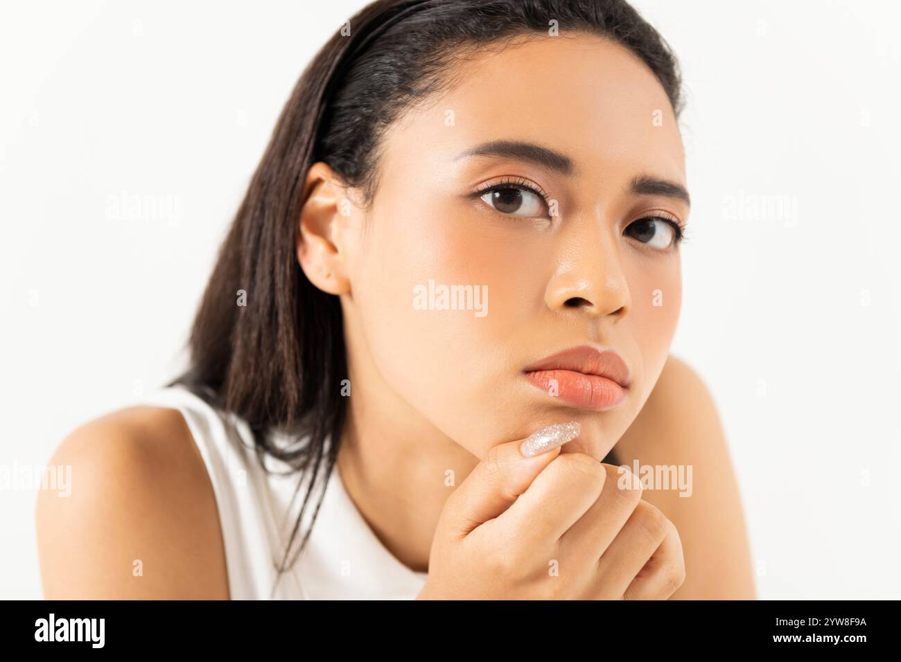 Half-woman with a melancholy look on her face Stock Photo - Alamy