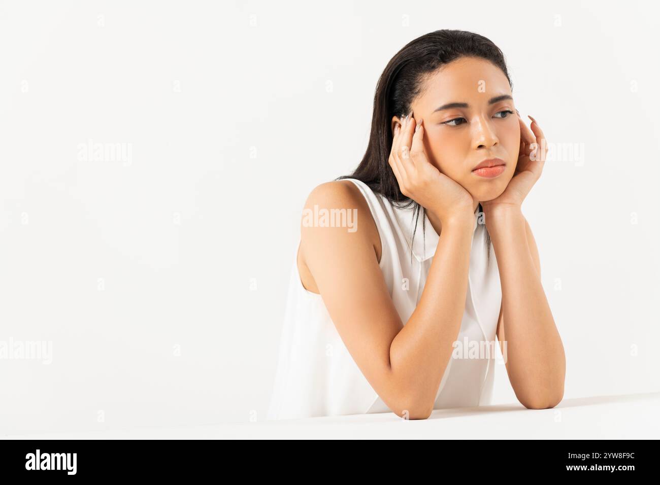 Half-woman with a melancholy look on her face Stock Photo - Alamy