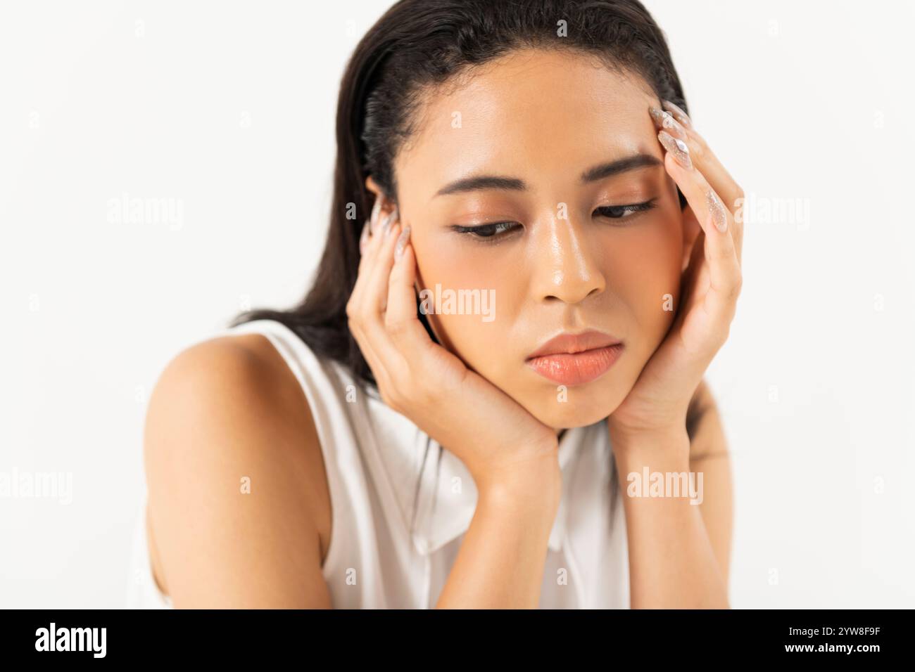 Half-woman with a melancholy look on her face Stock Photo - Alamy