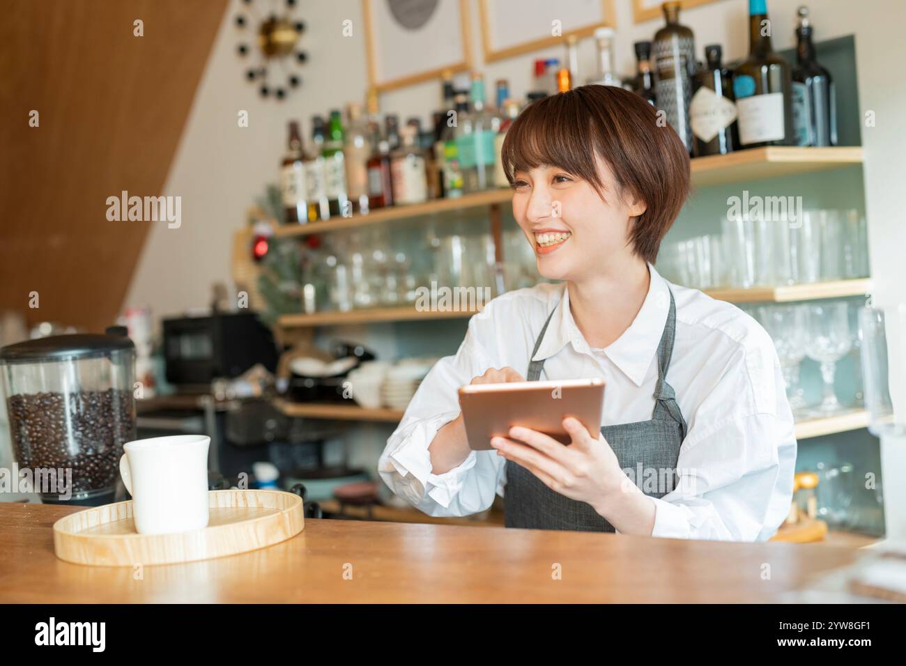 Café worker at work Stock Photo - Alamy