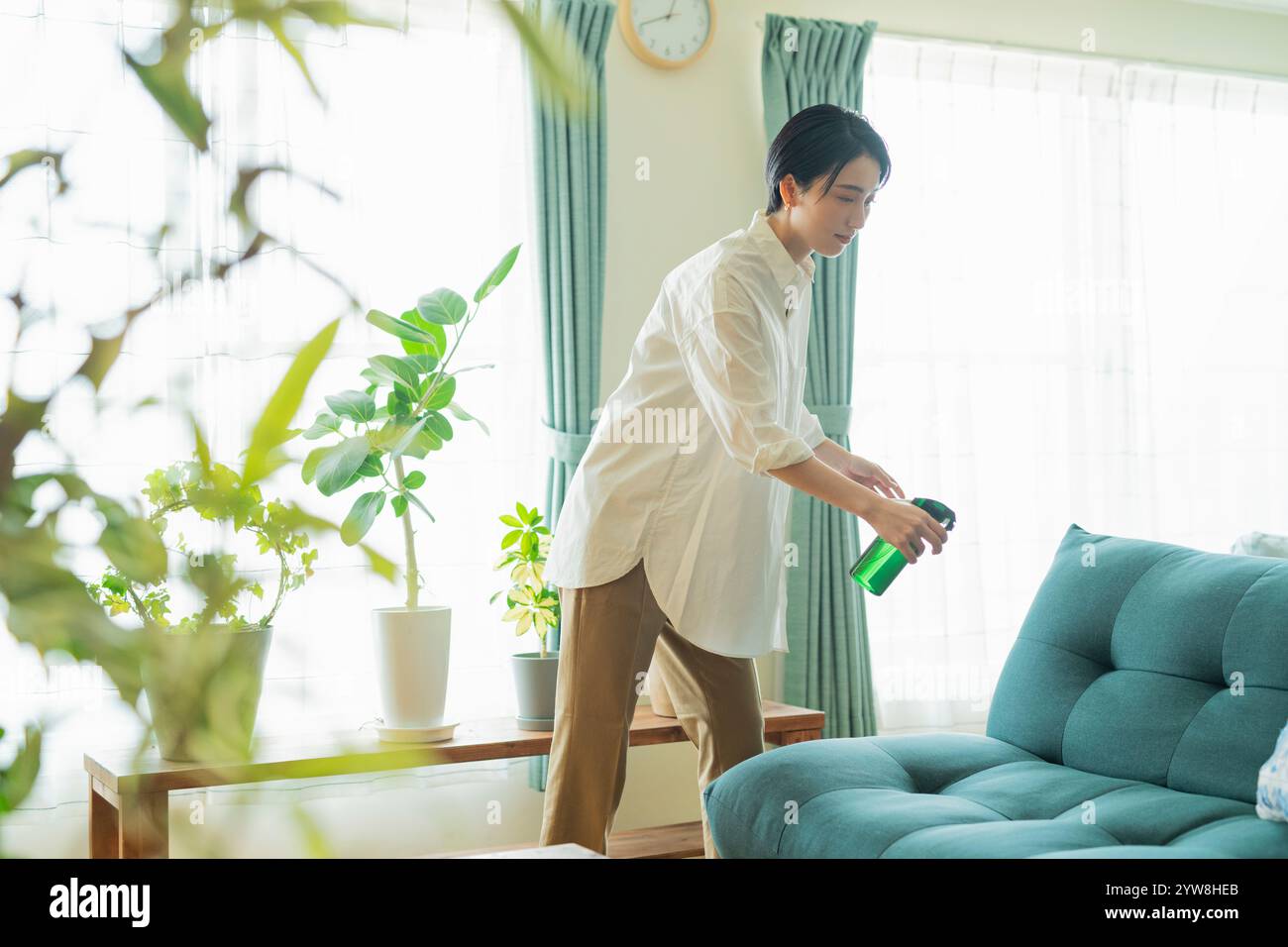 Woman cleaning the room Stock Photo - Alamy