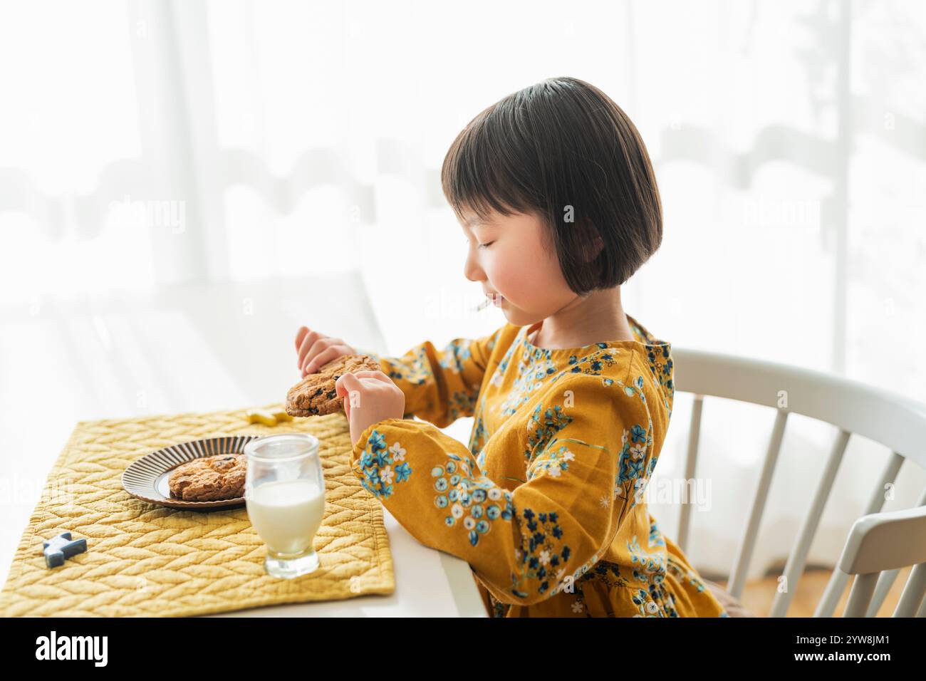 Cute child eating cookies hi-res stock photography and images - Alamy