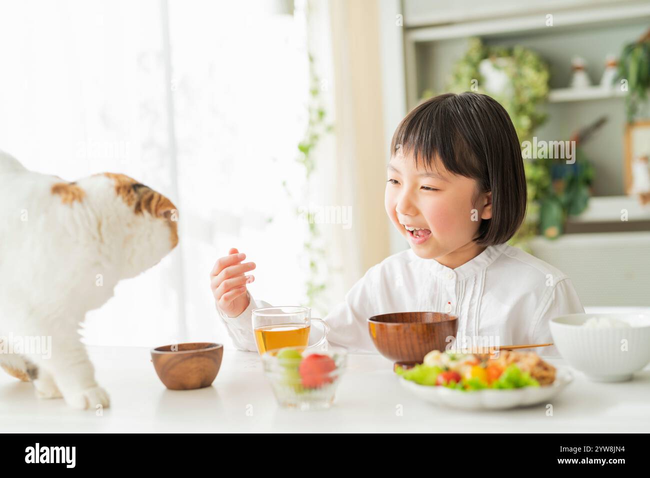 Cute girl eating soup hi-res stock photography and images - Alamy