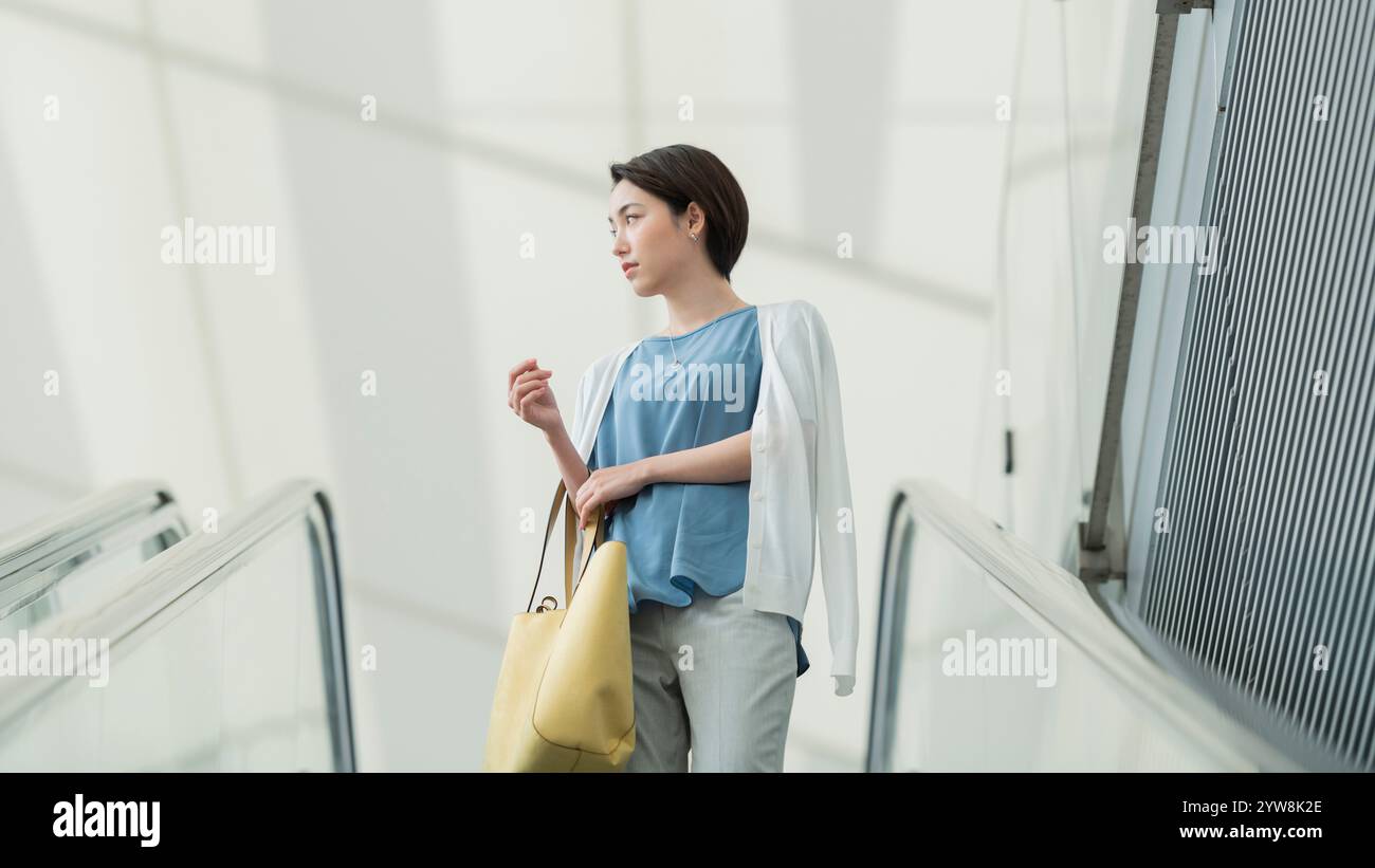 Stylish escalator hi-res stock photography and images - Alamy
