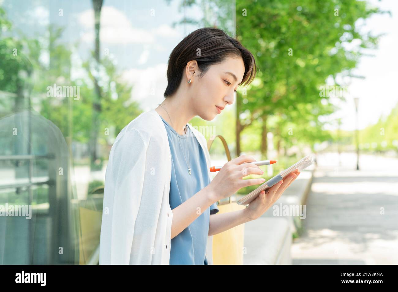 Person operating device hi-res stock photography and images - Alamy