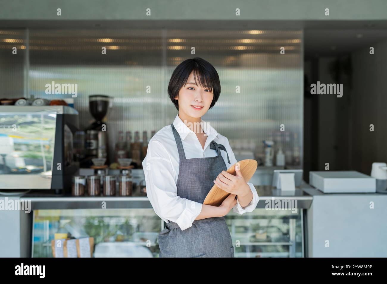 Café Female staff Stock Photo - Alamy
