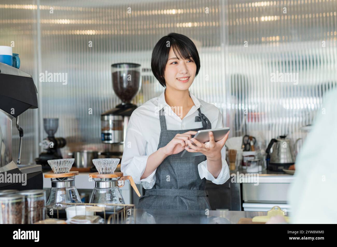 Café staff taking orders hi-res stock photography and images - Alamy