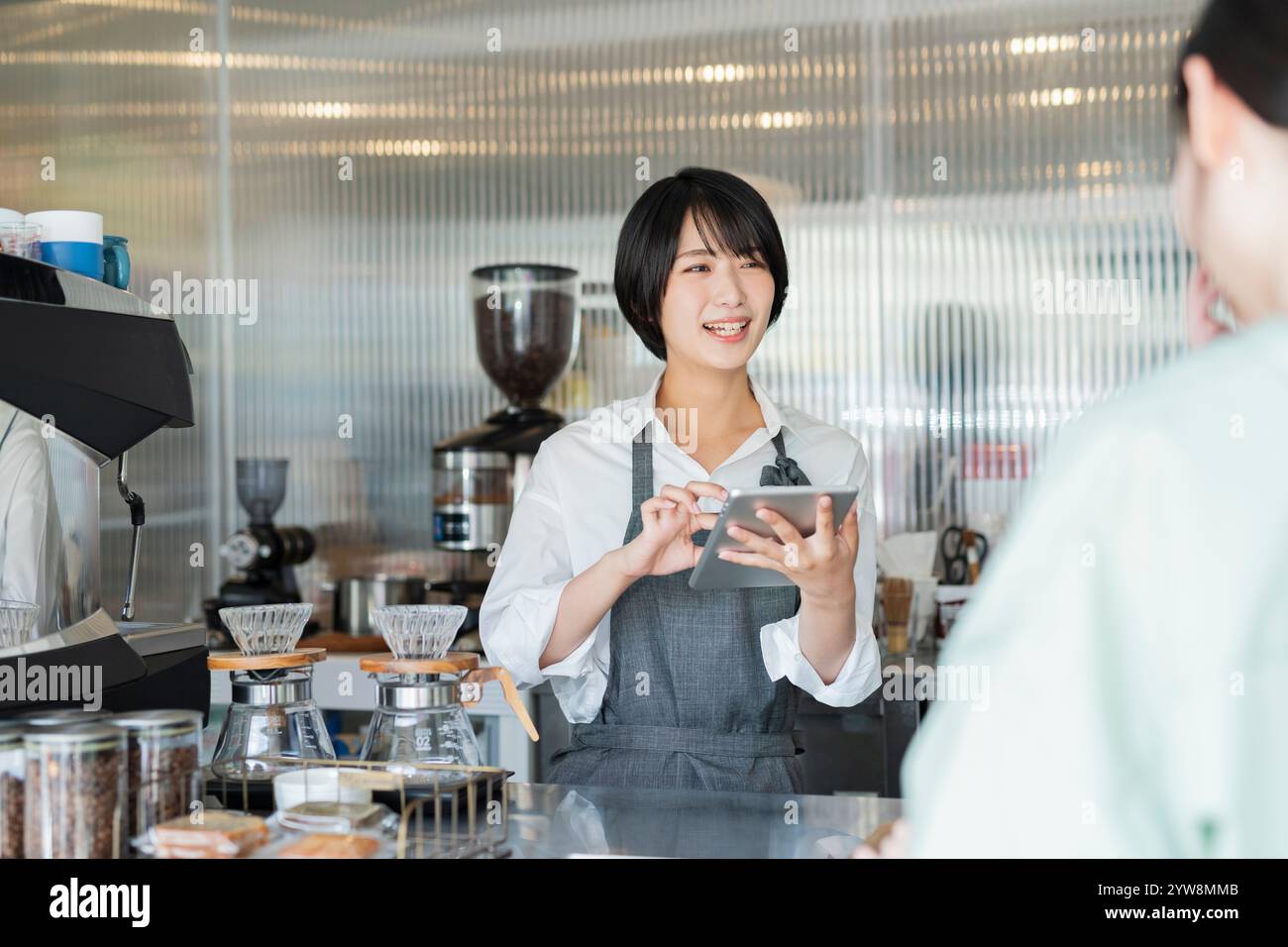 Female staff taking order hi-res stock photography and images - Alamy