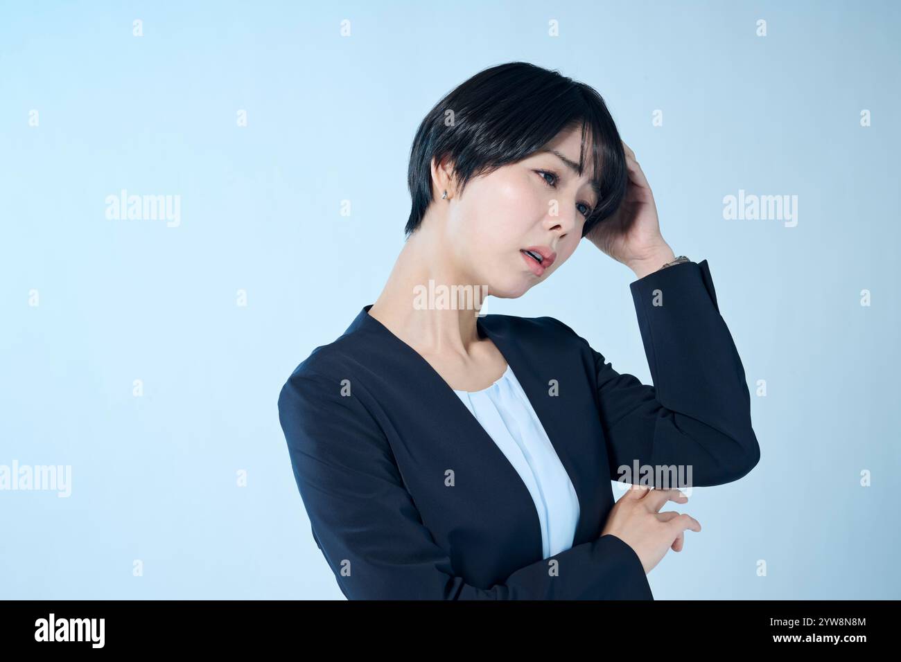 Female office worker with short hair who looks out of shape Stock Photo ...