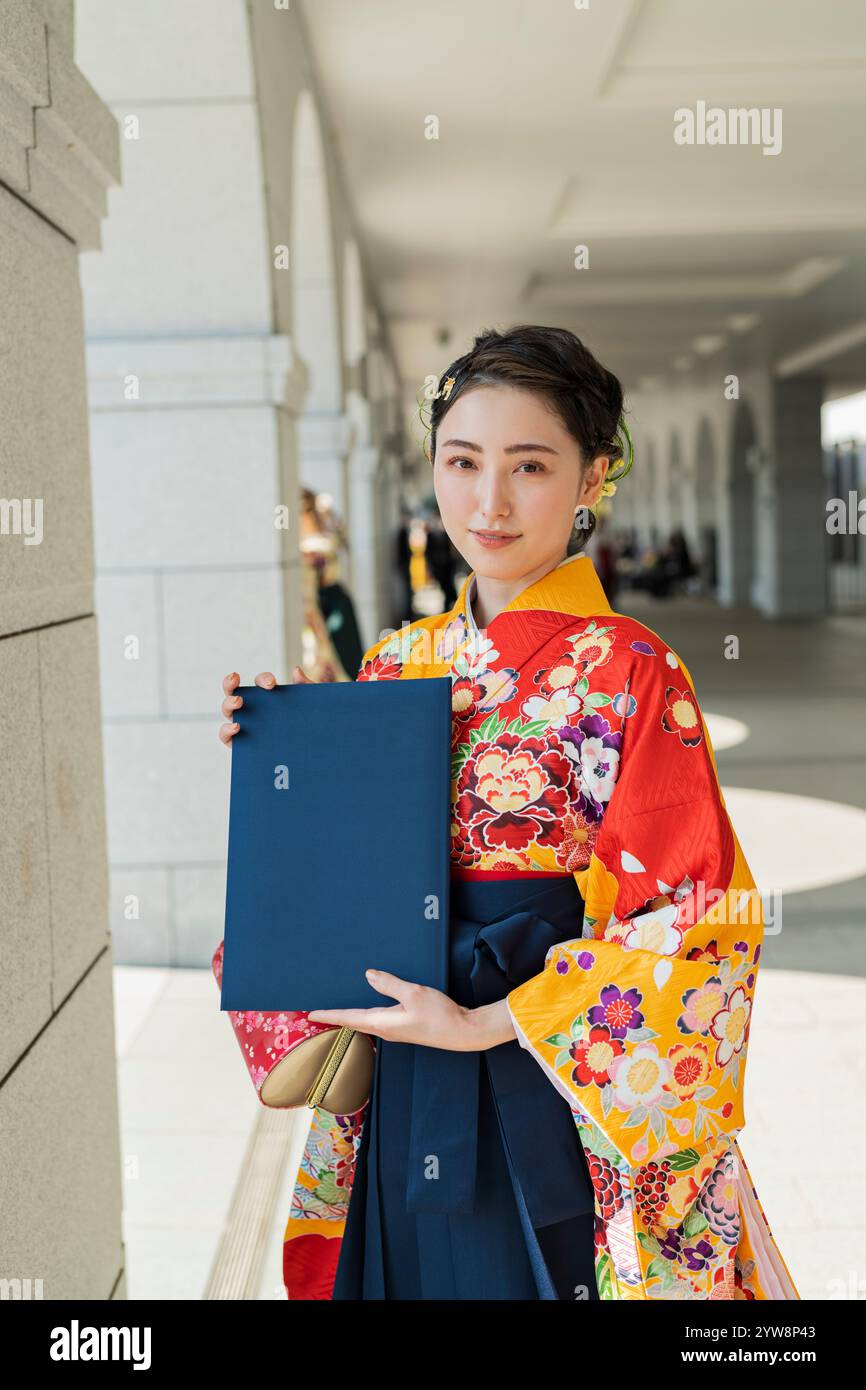Female university students celebrating their graduation Stock Photo - Alamy