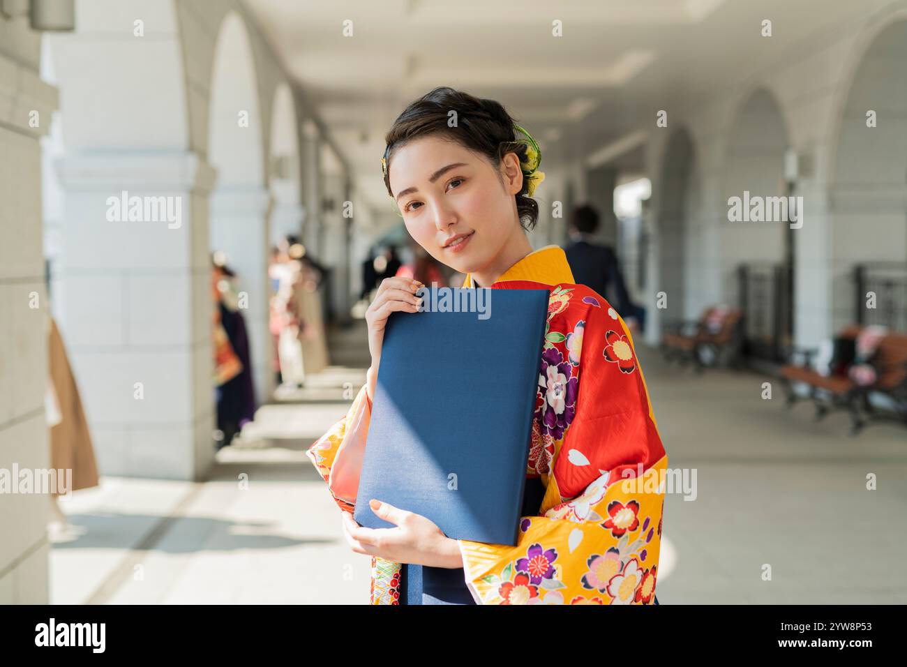Female university students celebrating their graduation Stock Photo - Alamy
