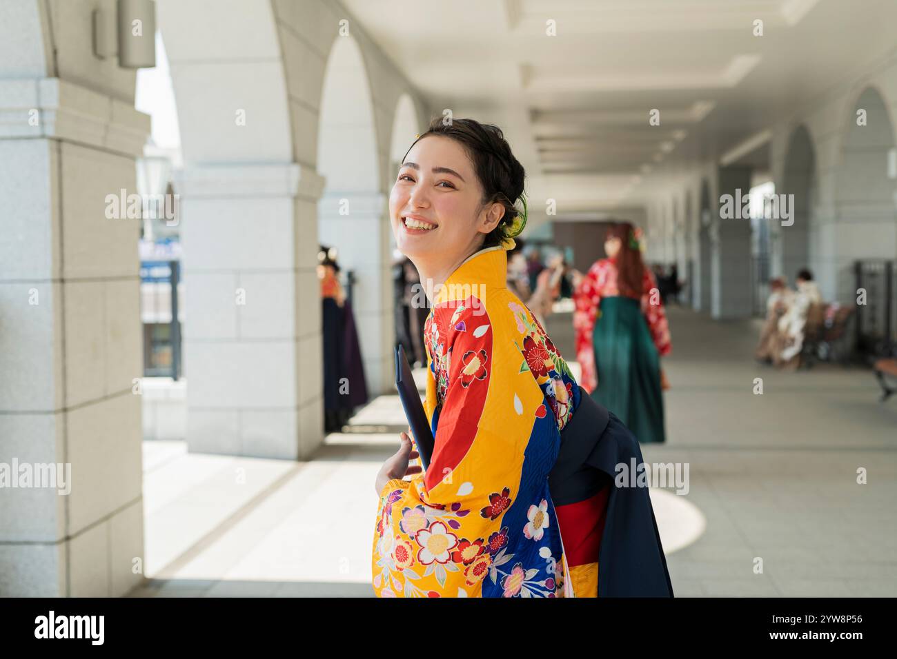 Female university students celebrating their graduation Stock Photo - Alamy