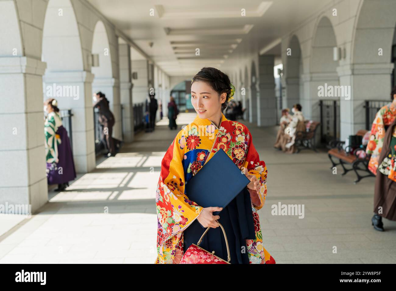 Female university students celebrating their graduation Stock Photo - Alamy