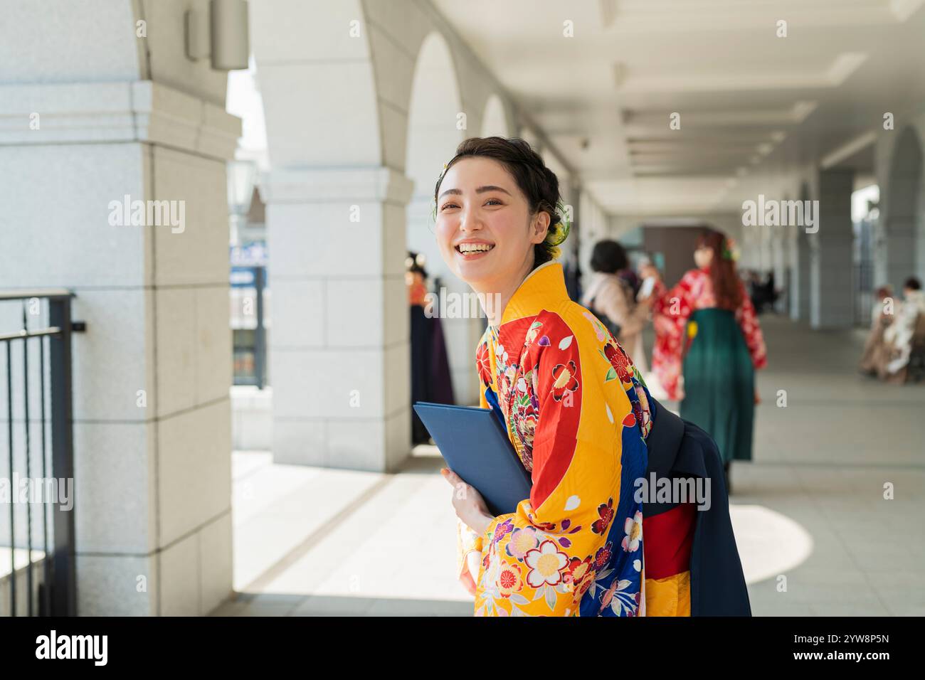 Female university students celebrating their graduation Stock Photo - Alamy