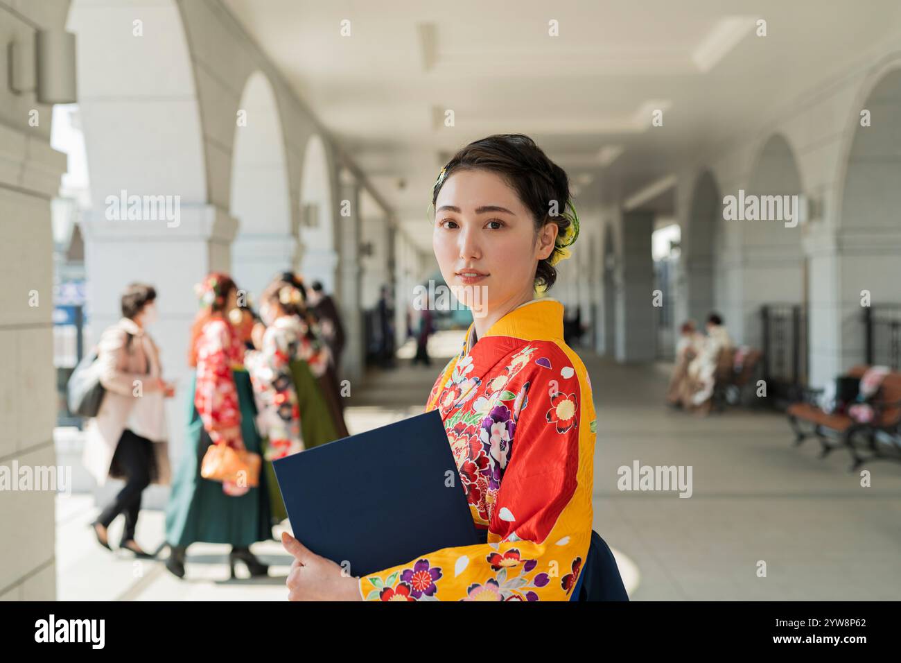 Female university students celebrating their graduation Stock Photo - Alamy