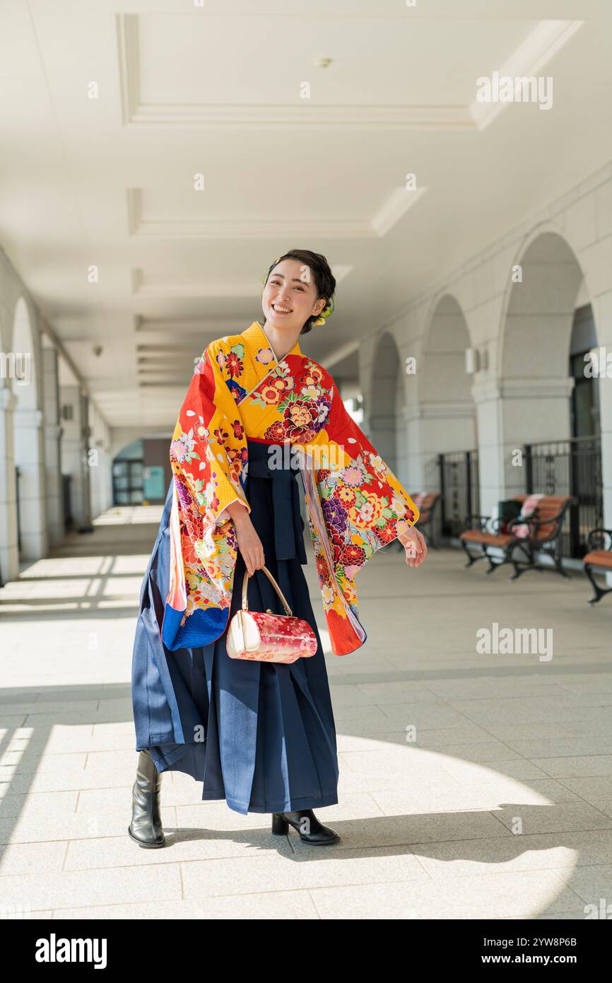 Female university students celebrating their graduation Stock Photo - Alamy