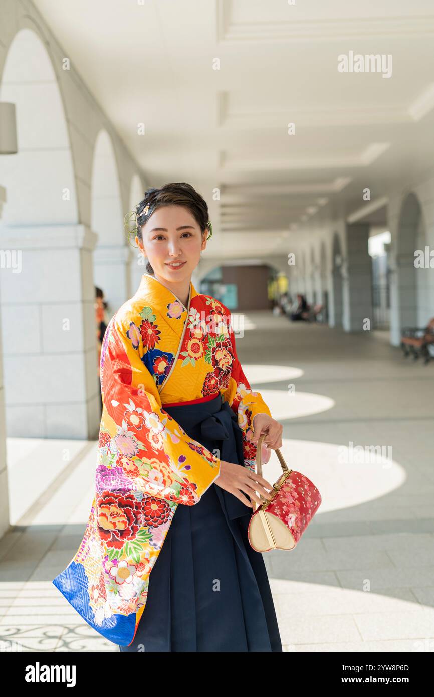 Female university students celebrating their graduation Stock Photo - Alamy