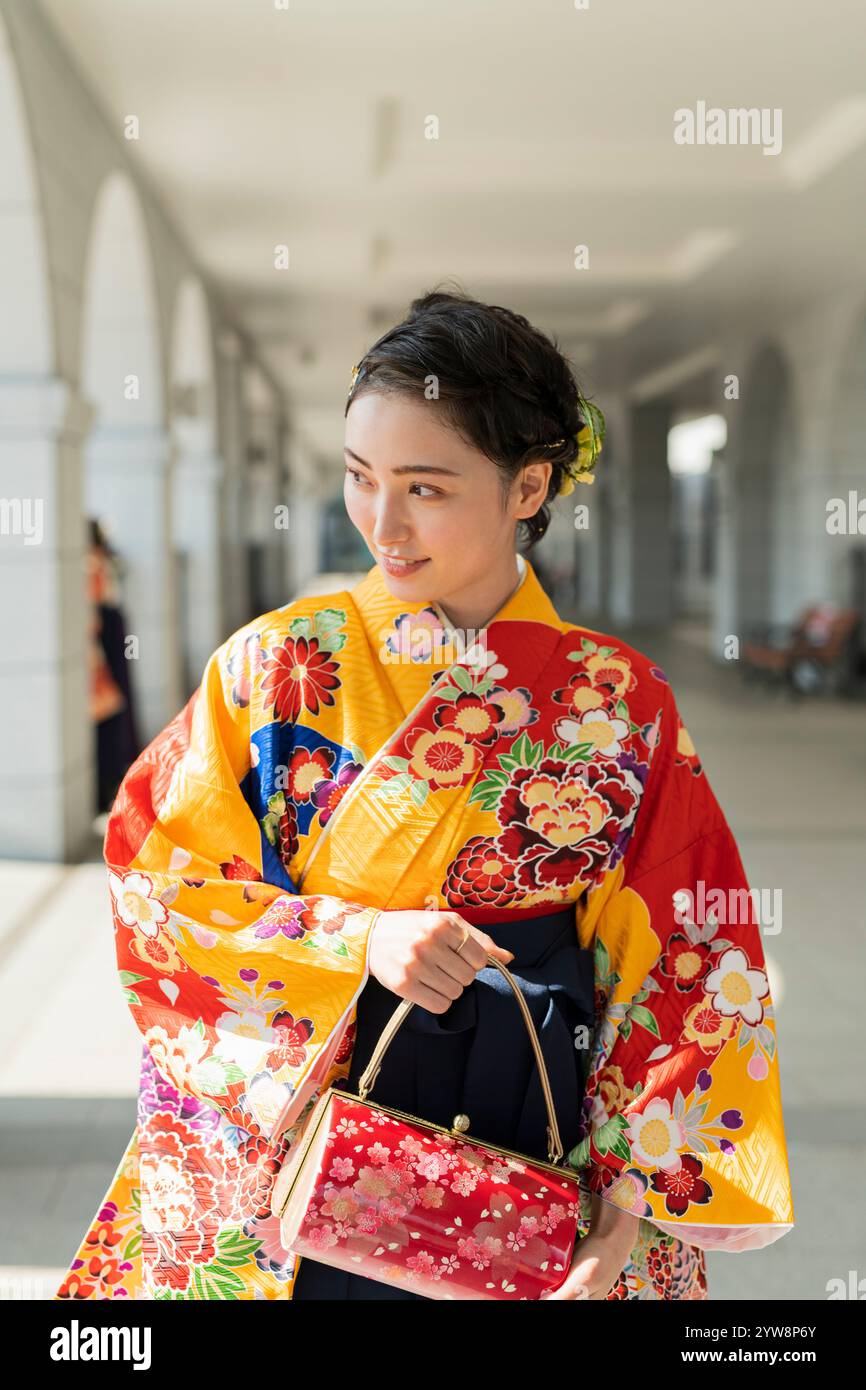 Female university students celebrating their graduation Stock Photo - Alamy