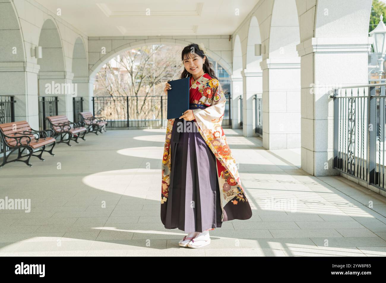 Female university students celebrating their graduation Stock Photo - Alamy