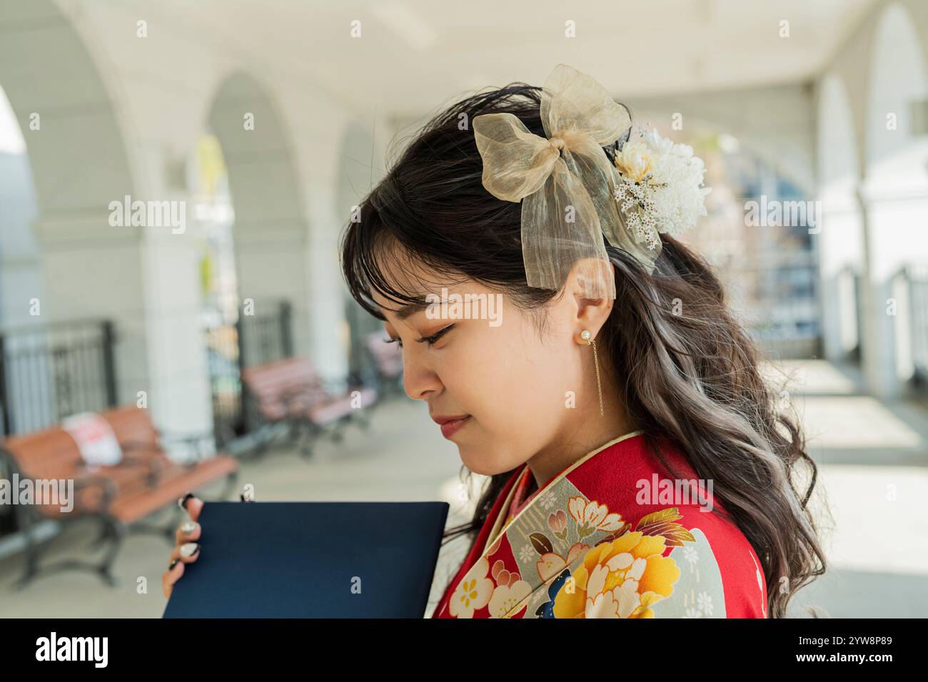 Female university students celebrating their graduation Stock Photo - Alamy