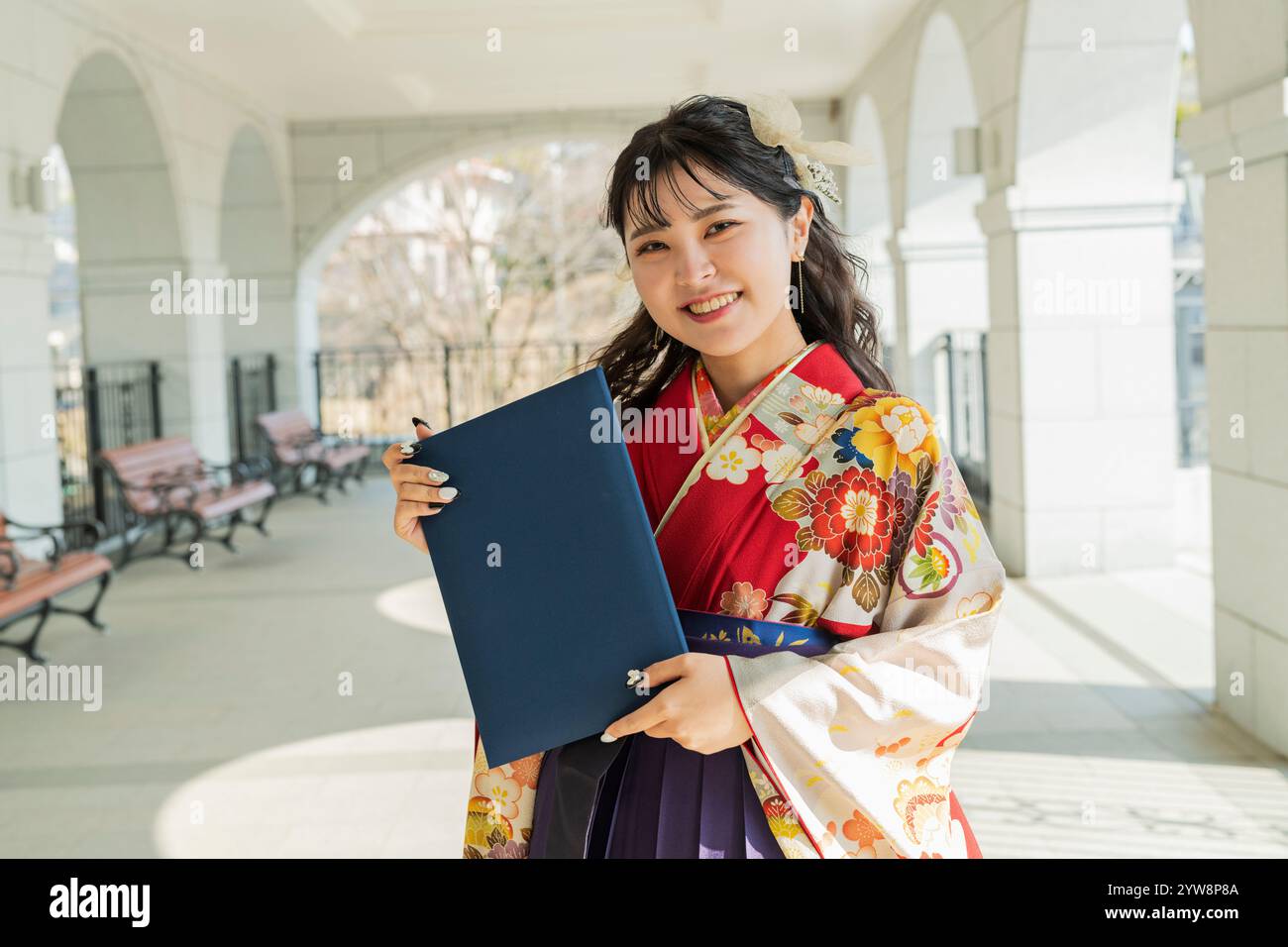 Female university students celebrating their graduation Stock Photo - Alamy