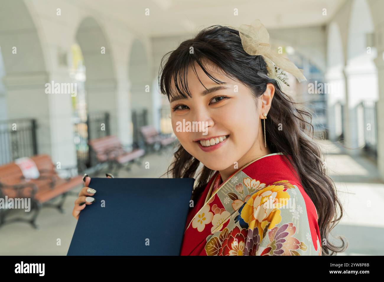 Female university students celebrating their graduation Stock Photo - Alamy