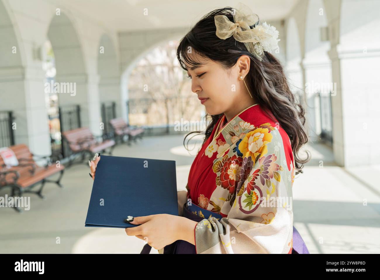 Female university students celebrating their graduation Stock Photo - Alamy