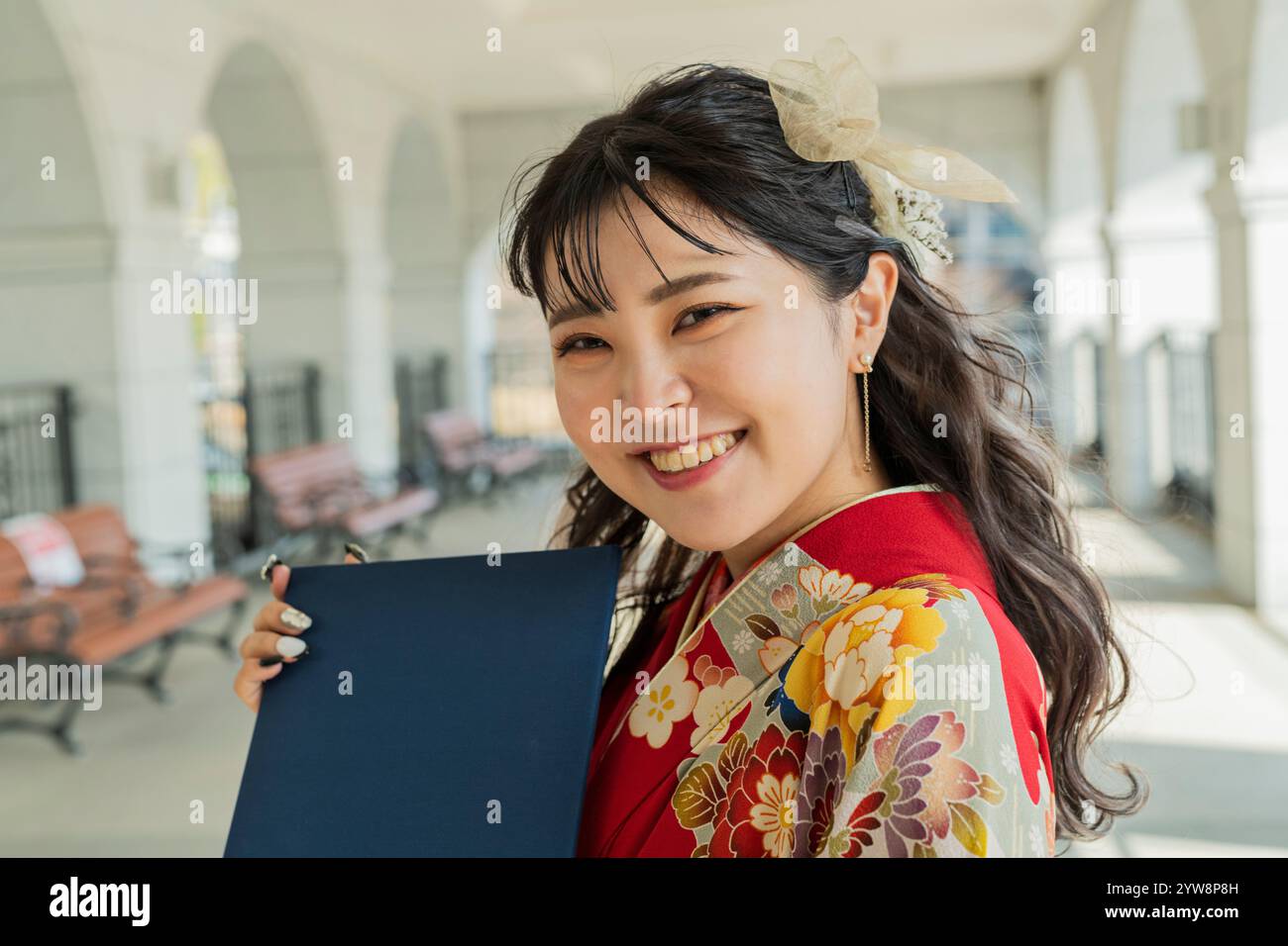 Female university students celebrating their graduation Stock Photo - Alamy