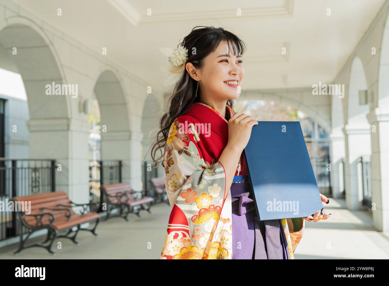 Female university students celebrating their graduation Stock Photo - Alamy