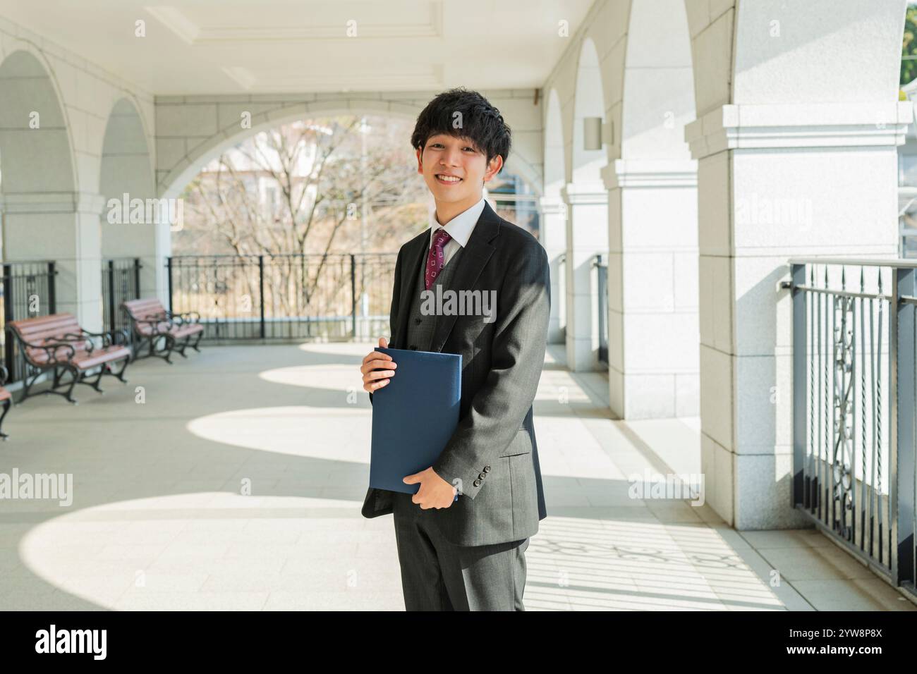 Graduation ceremony Male university student Stock Photo - Alamy