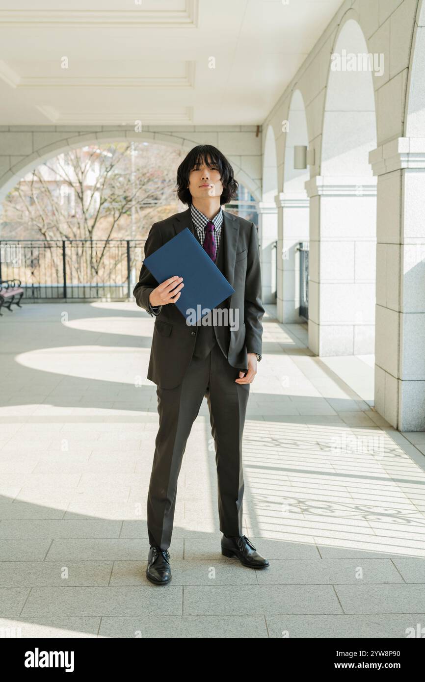 Graduation ceremony Male university student Stock Photo - Alamy