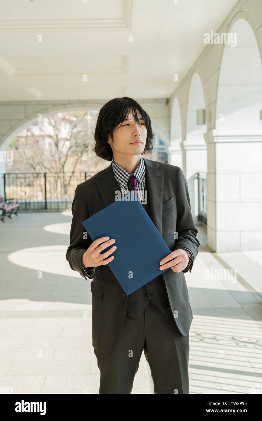 Graduation ceremony Male university student Stock Photo - Alamy
