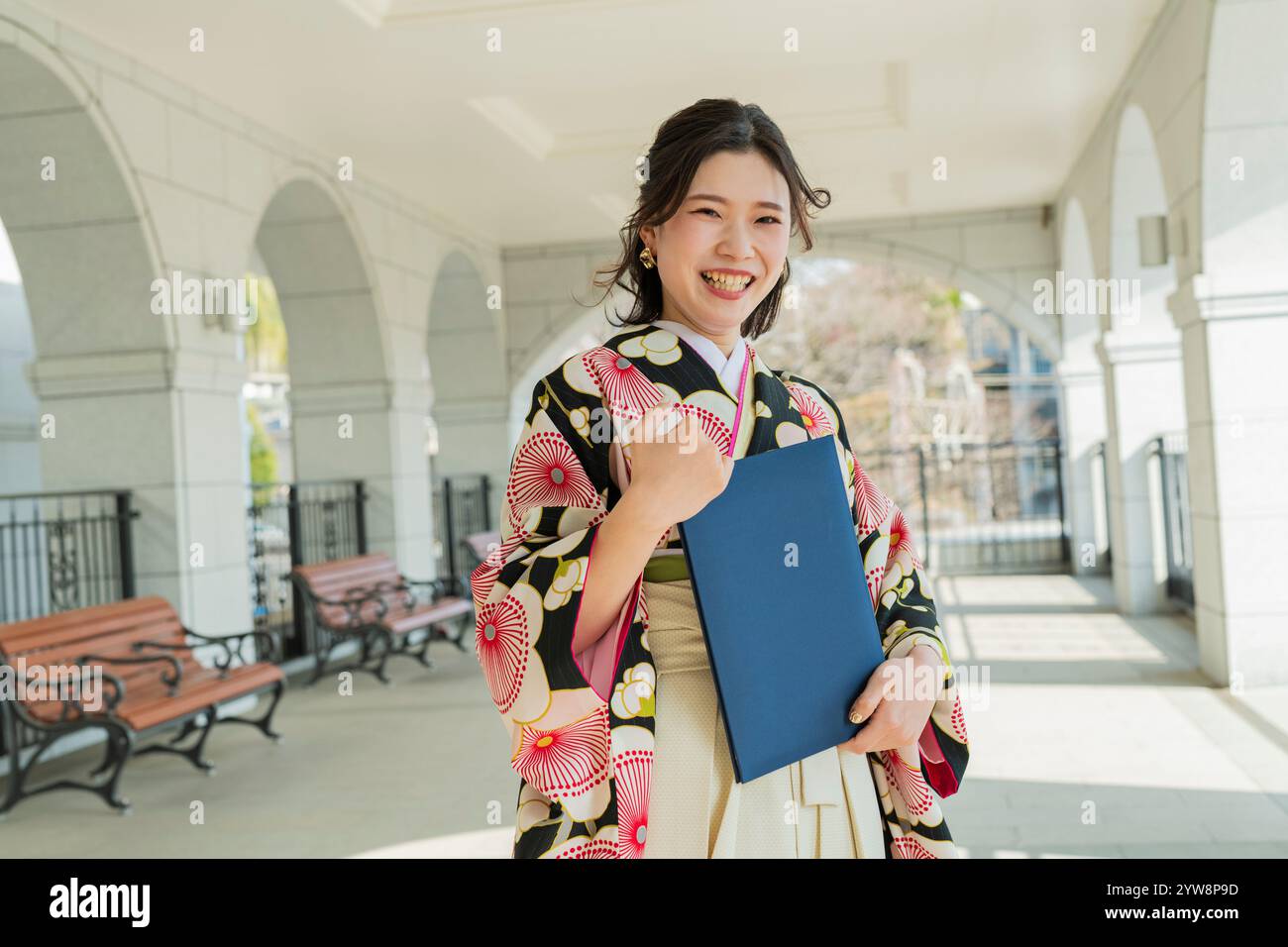 Female university students celebrating their graduation Stock Photo - Alamy