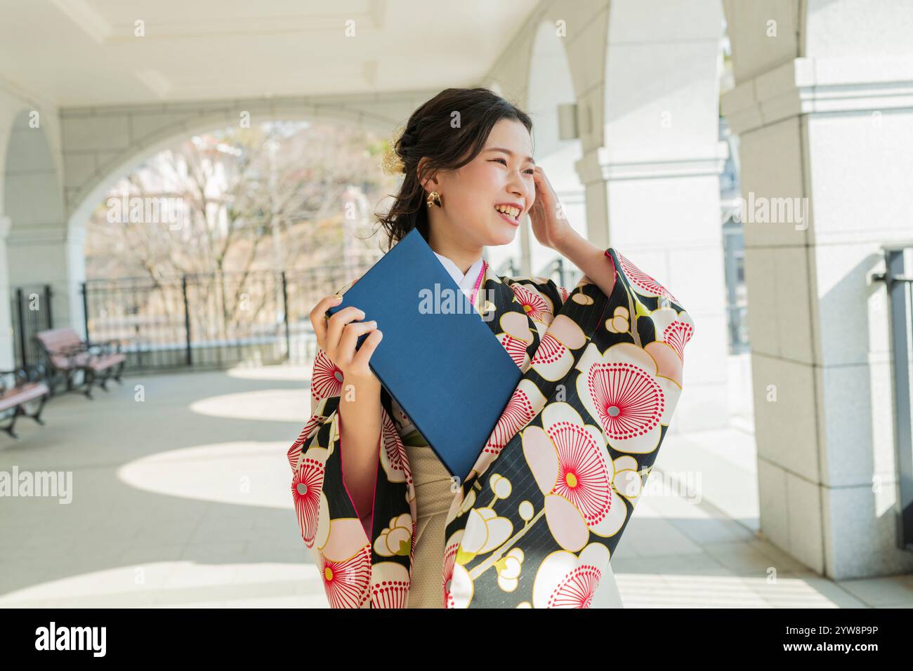 Female university students celebrating their graduation Stock Photo - Alamy