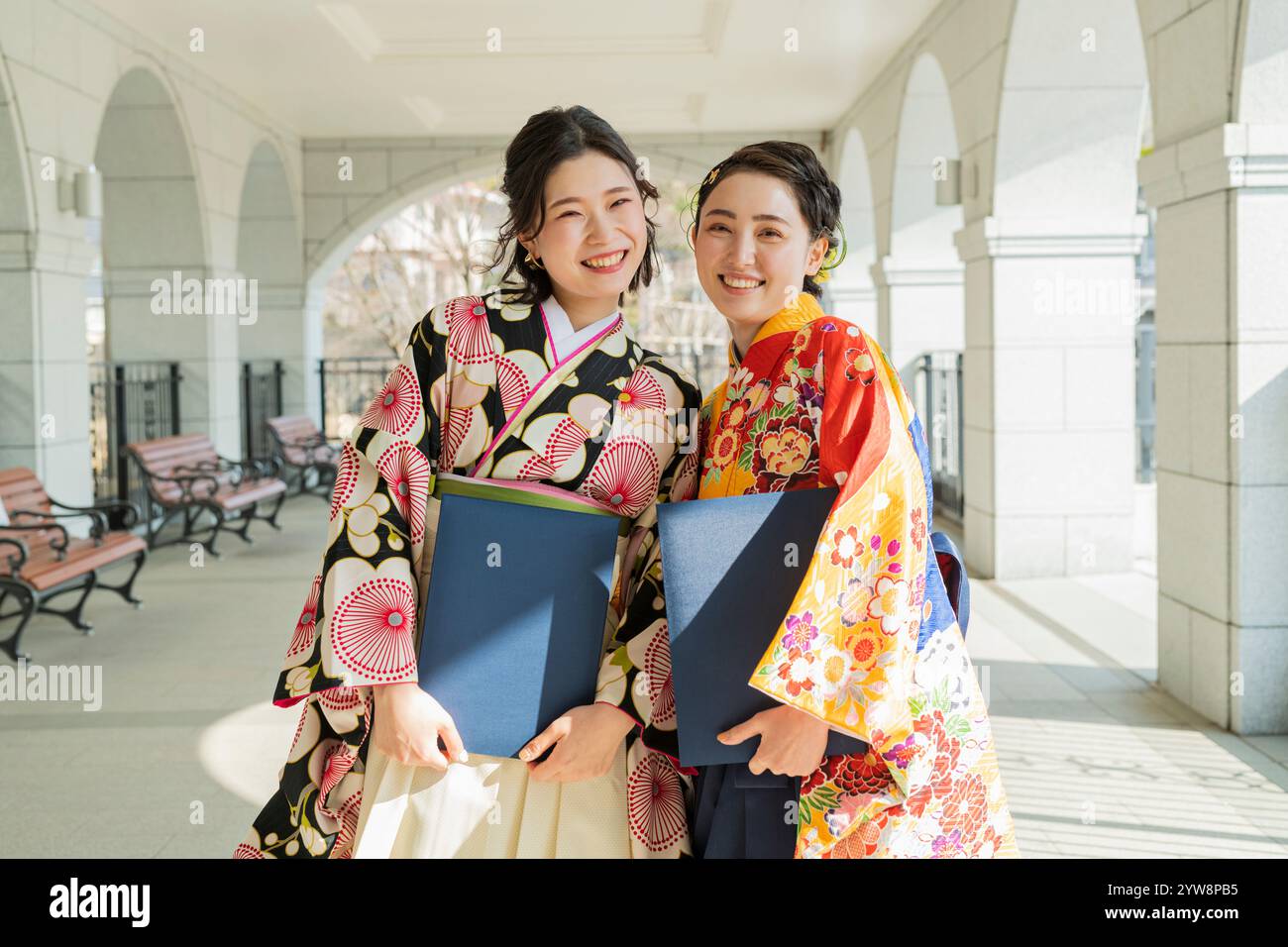 Graduation ceremony - college girl looking friendly Stock Photo - Alamy