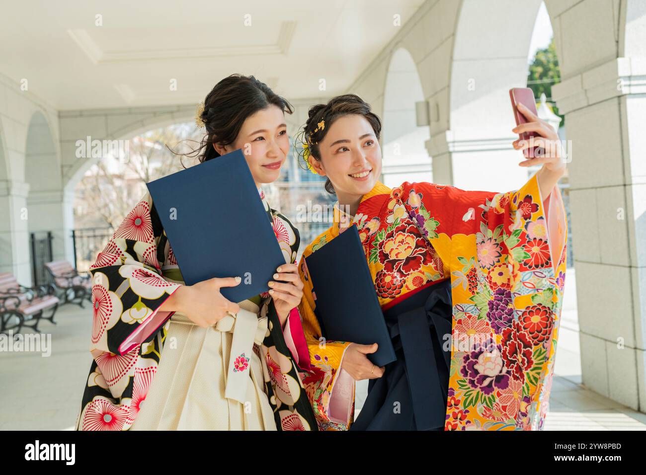 Graduation ceremony College students taking photos at graduation ...