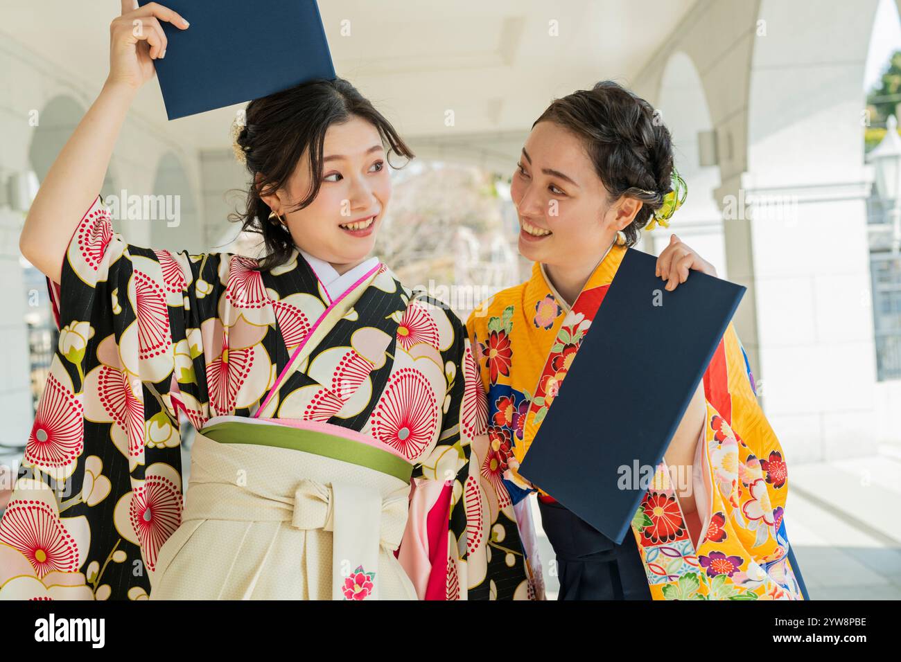 Graduation ceremony - college girl looking friendly Stock Photo - Alamy