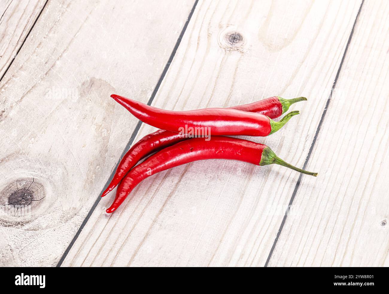 Hot and spicy chili pepper heap Stock Photo - Alamy