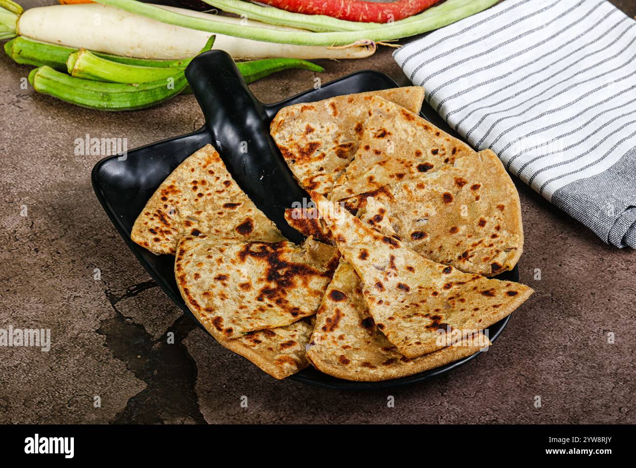 Indian vegetarian Aloo Paratha - bread with potato Stock Photo - Alamy
