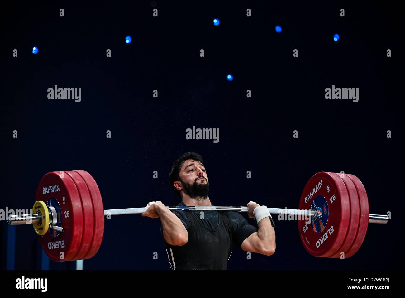 Isa Rustamov of Azerbaijan competes in clean & jerk, in the 73 kg men ...