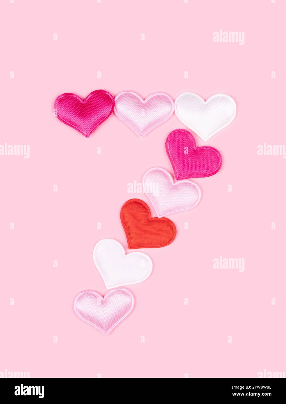 Number 7 seven made of glossy atlas hearts isolated on solid pink ...