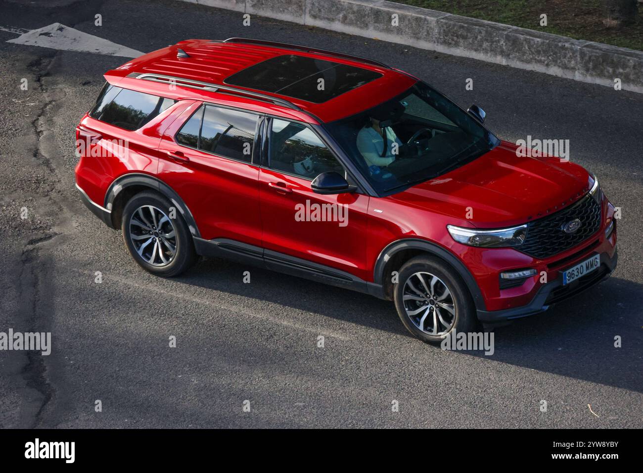 Modern red ford explorer st line suv driving on an asphalt road Stock ...