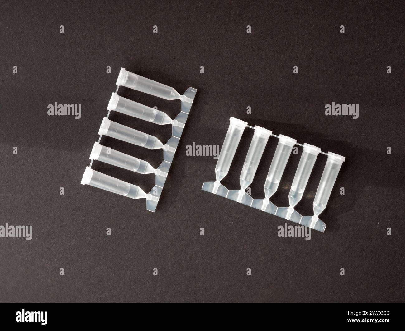 Disposable eye drops isolated on dark background. Pack of eye drops ...