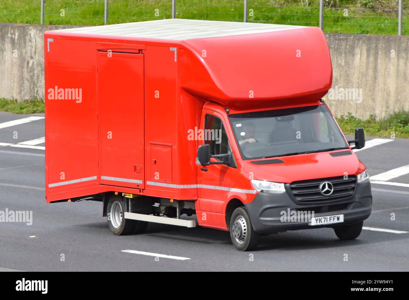Driver side front roof view red hard body Mercedes chassis over cab ...