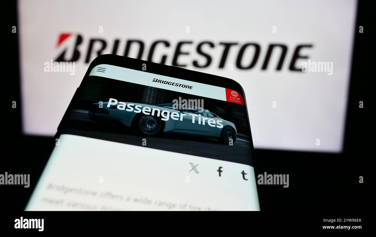 In this photo illustration, a mobile phone with the website of Japanese ...