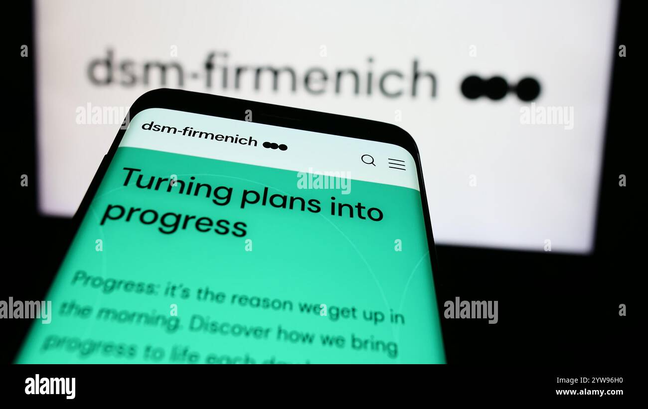 In this photo illustration, a mobile phone with the website of Swiss ...