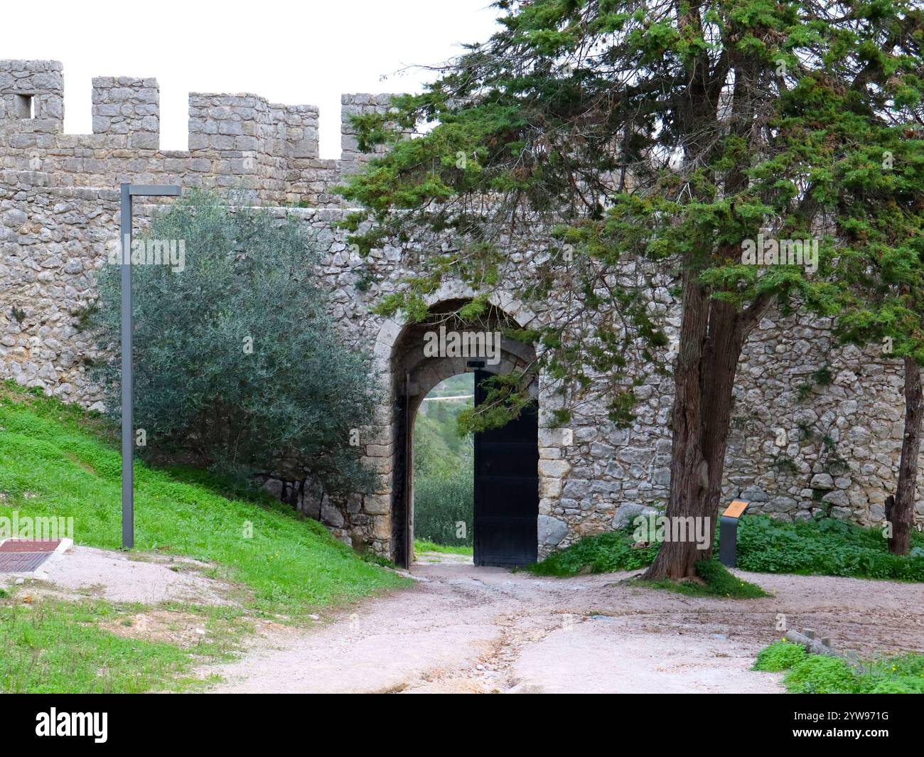 Fortified gate of Sesimbra Castle Stock Photo - Alamy
