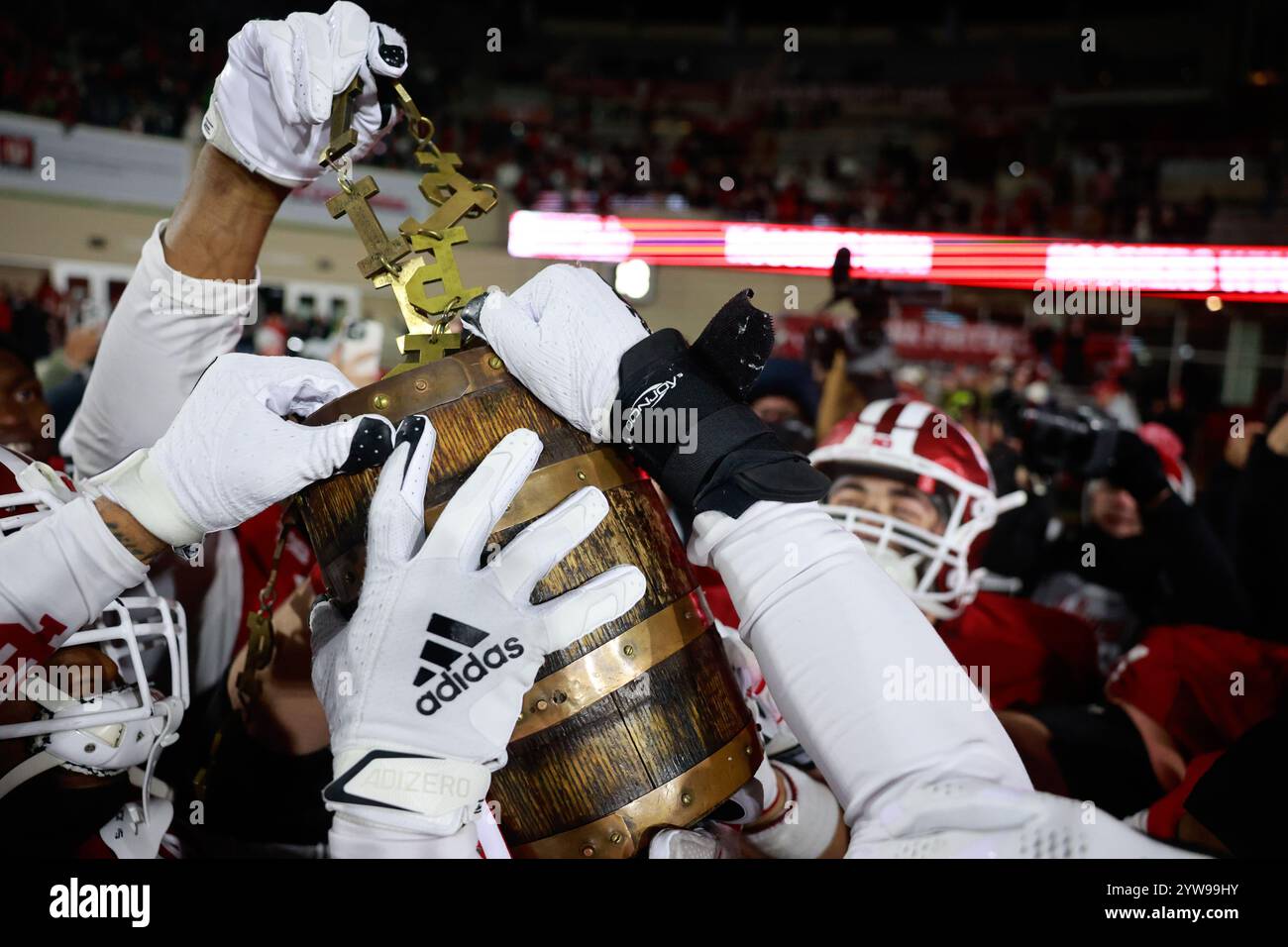 The Indiana University Hoosiers hoist the Old Oaken Bucket into the air ...