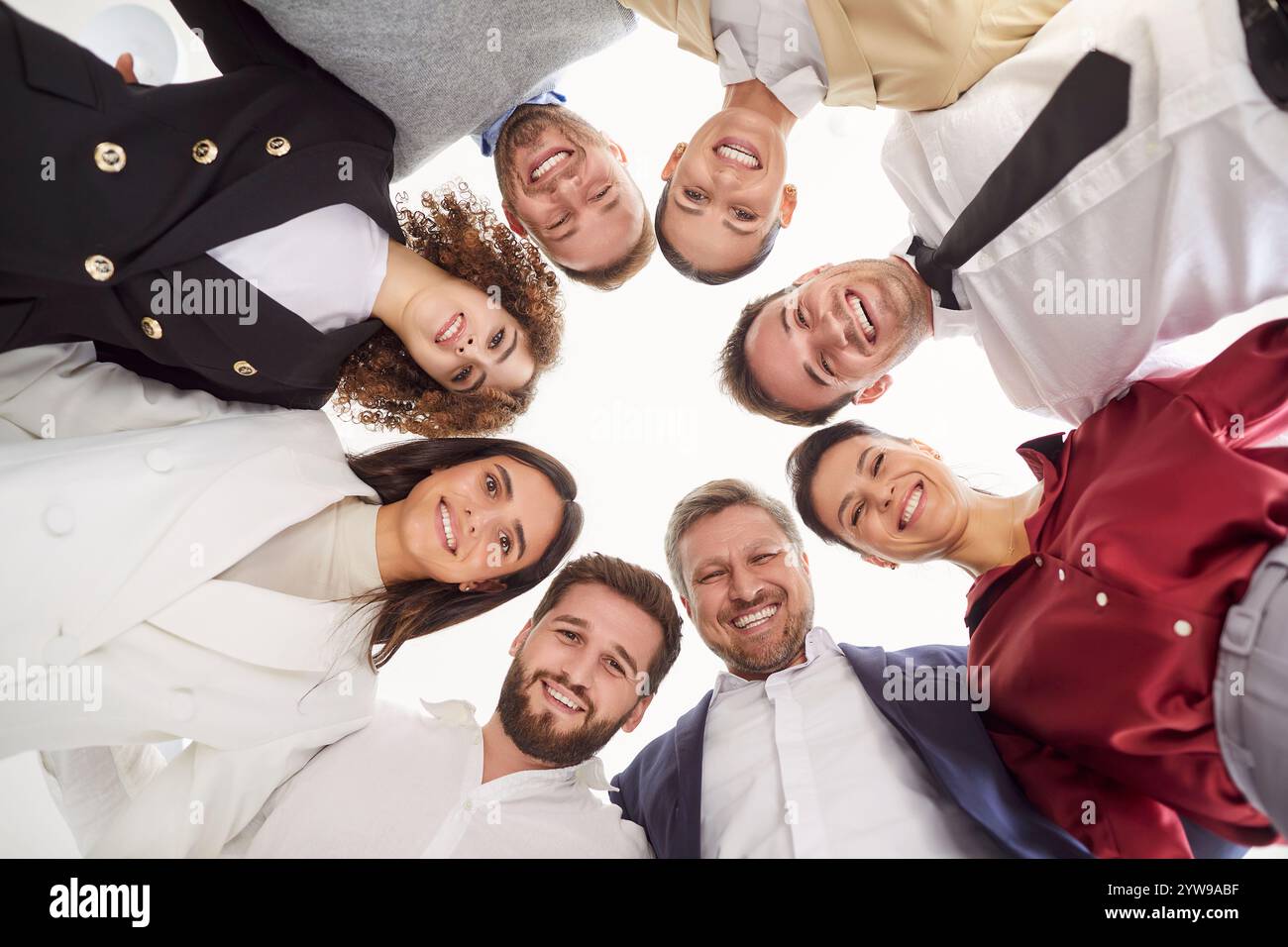 Bottom view portrait of a joyful smiling business people looking down ...