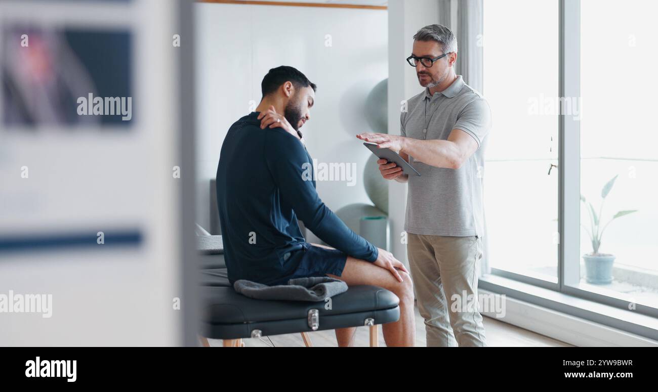 Physiotherapy, tablet and shoulder pain with people in clinic for ...